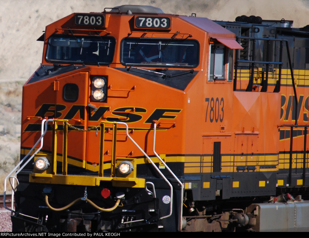 BNSF 7803 close up shot as the Engineer blows the Air Chimes or Nathan Air Horn at me as she ...